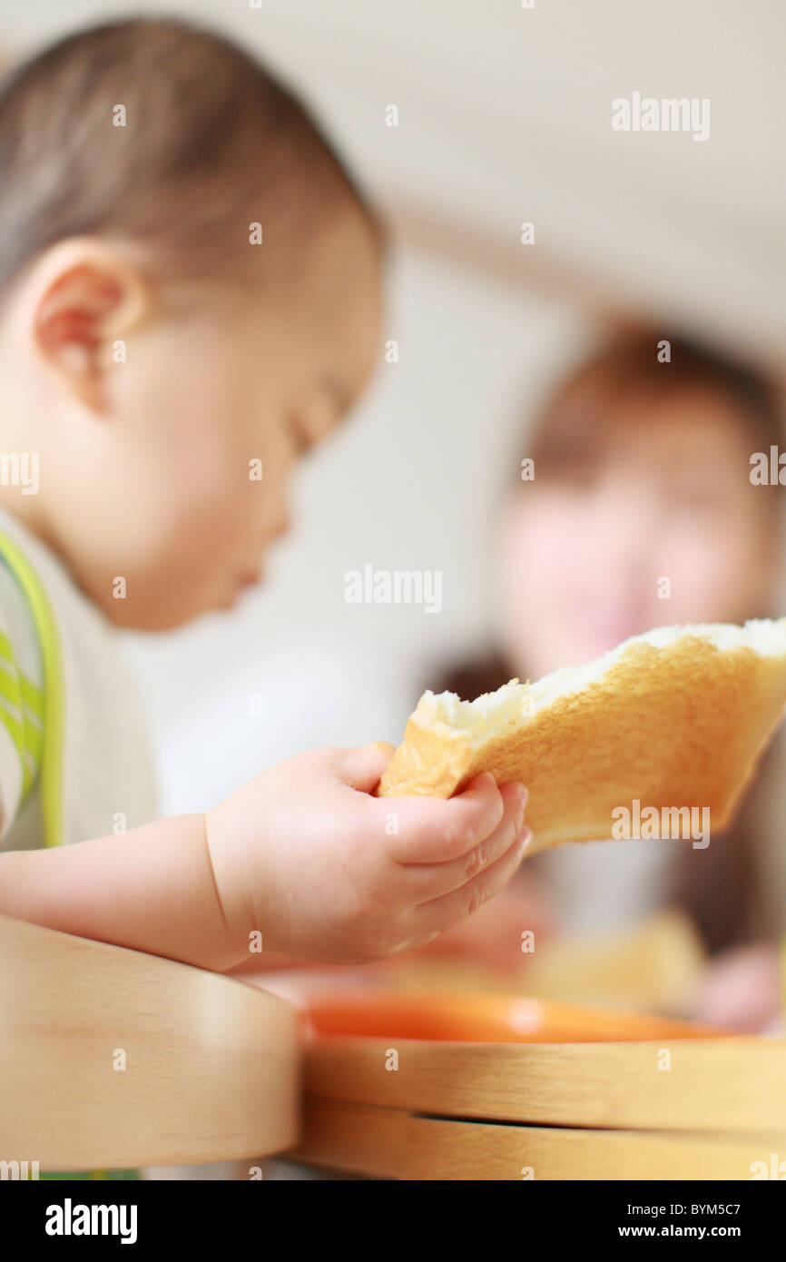 A boy eating breakfast Stock Photo - Alamy