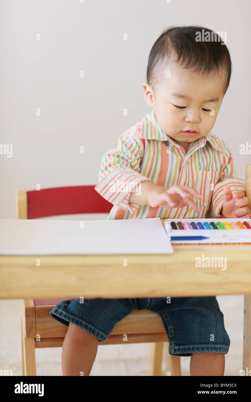 A boy drawing Stock Photo - Alamy