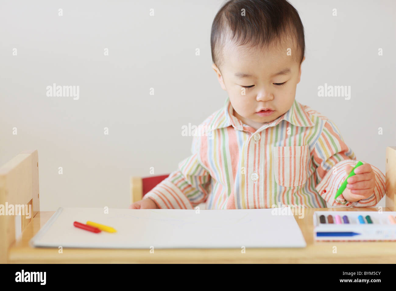 A boy drawing Stock Photo - Alamy