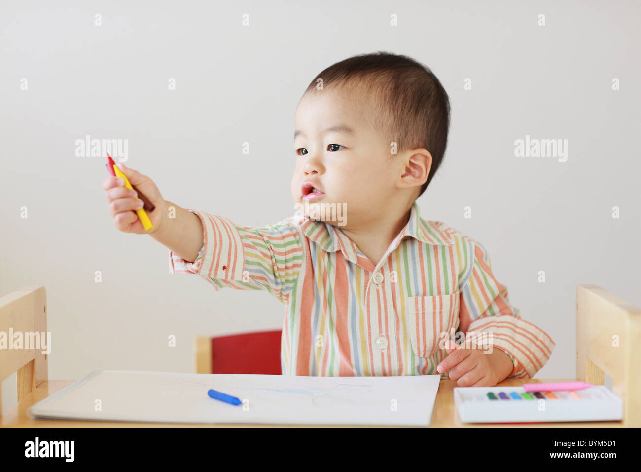 A boy drawing Stock Photo - Alamy
