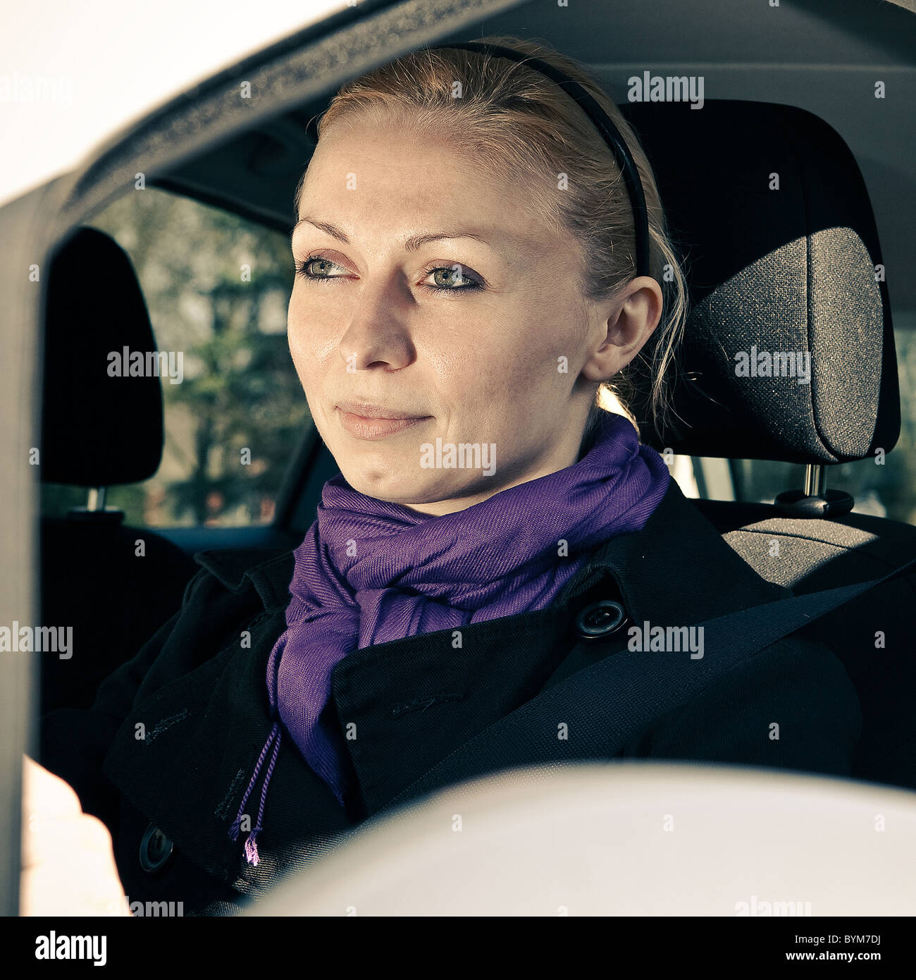 Woman Sitting In Car Getting Ready To Drive Stock Photo - Alamy