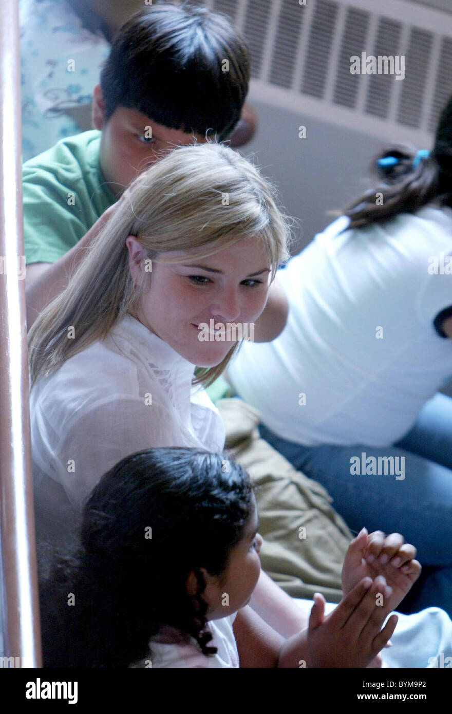 Jenna Bush, daughter of President George Bush sitting among the ...