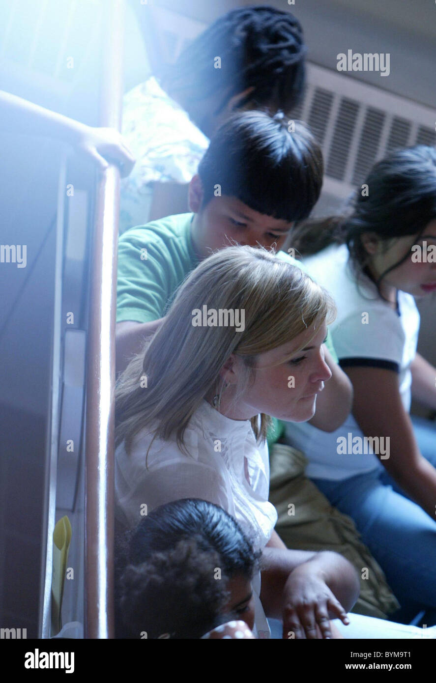 Jenna Bush, daughter of President George Bush sitting among the ...