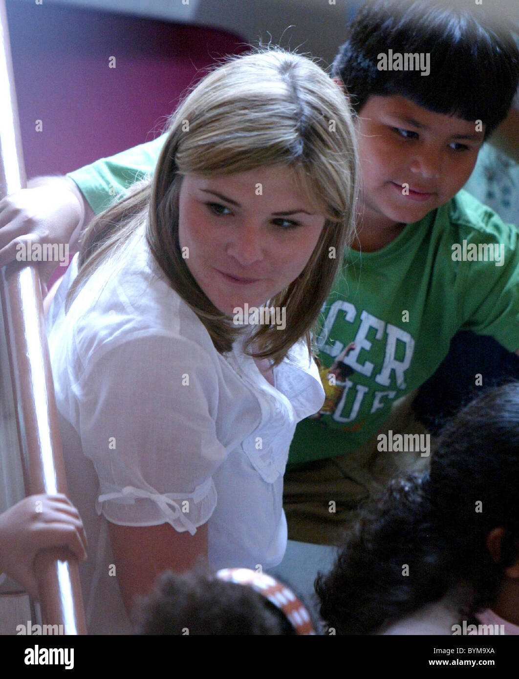 Jenna Bush, daughter of President George Bush sitting among the ...