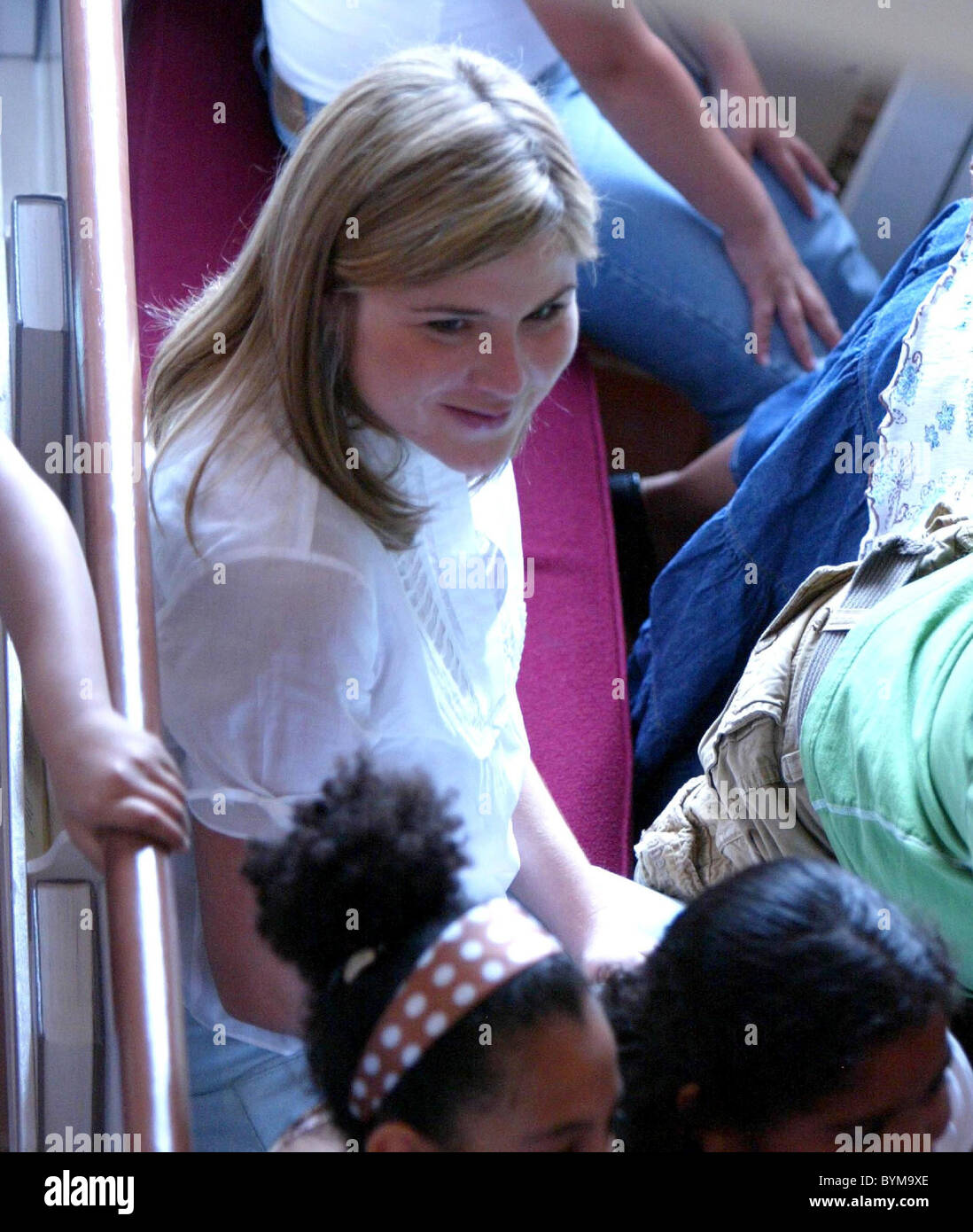 Jenna Bush, daughter of President George Bush sitting among the ...