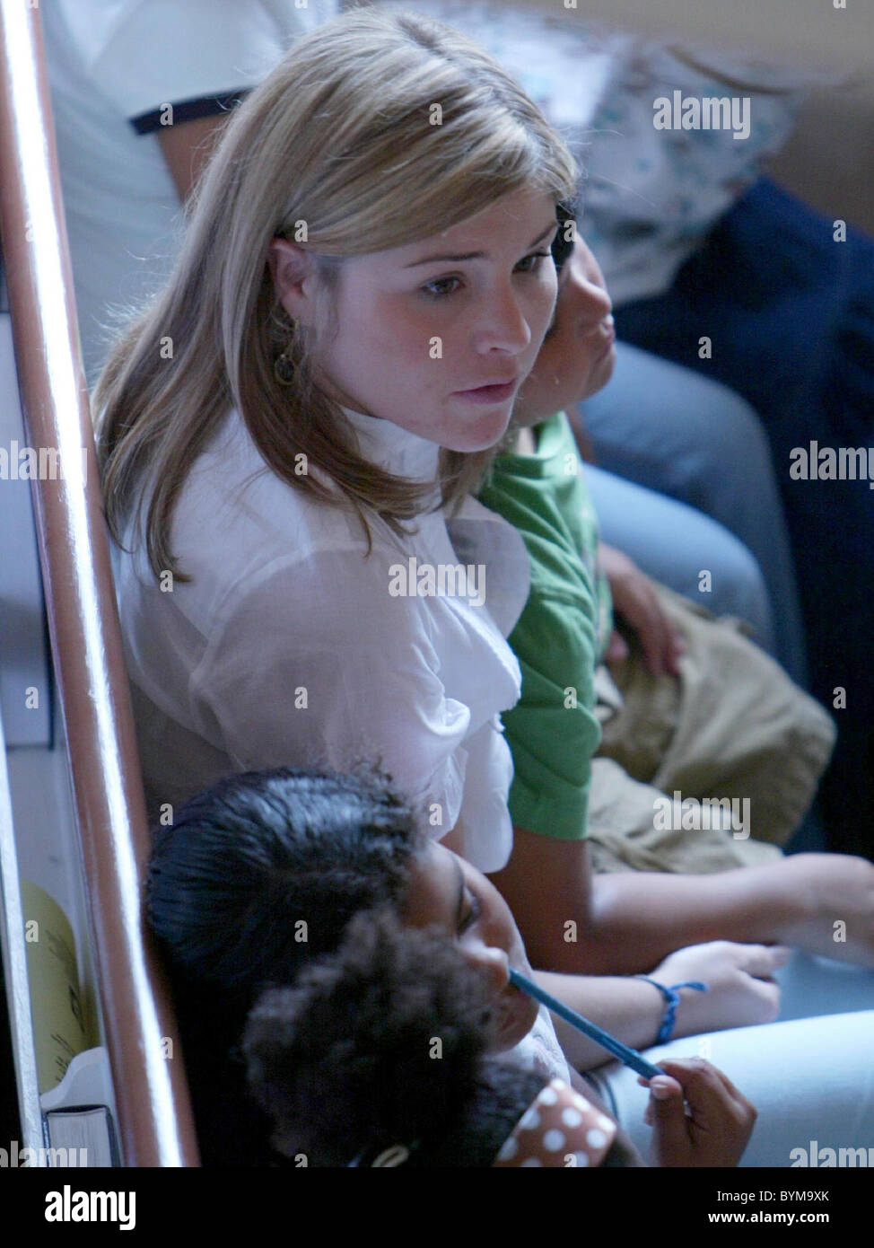 Jenna Bush, daughter of President George Bush sitting among the ...