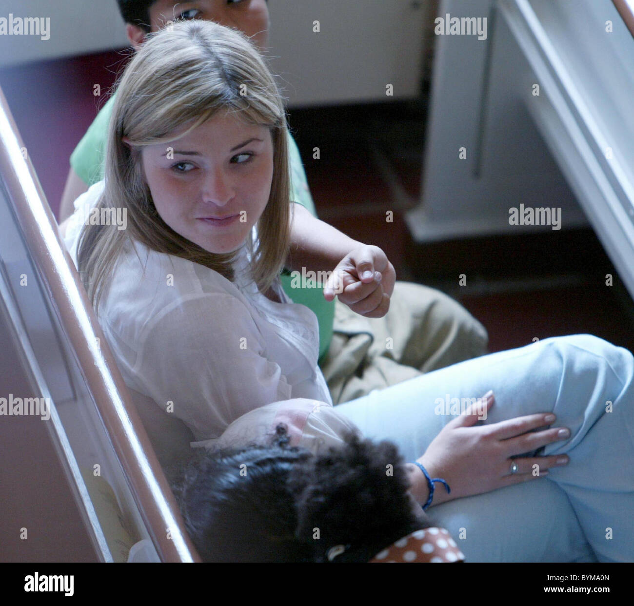 Jenna Bush, daughter of President George Bush sitting among the ...