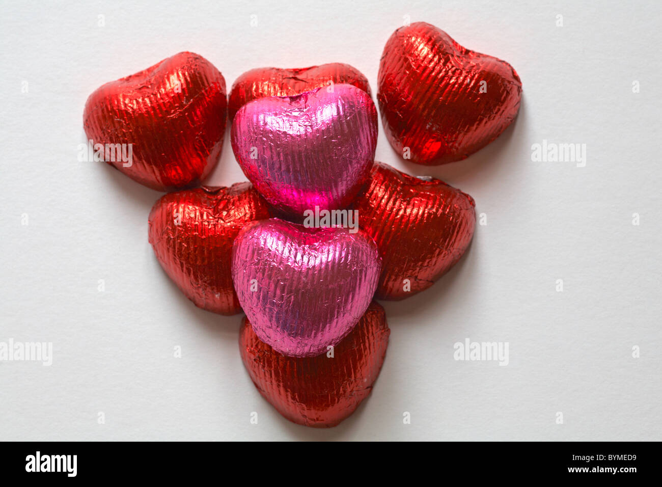 Stacked candy hearts white background hi-res stock photography and ...