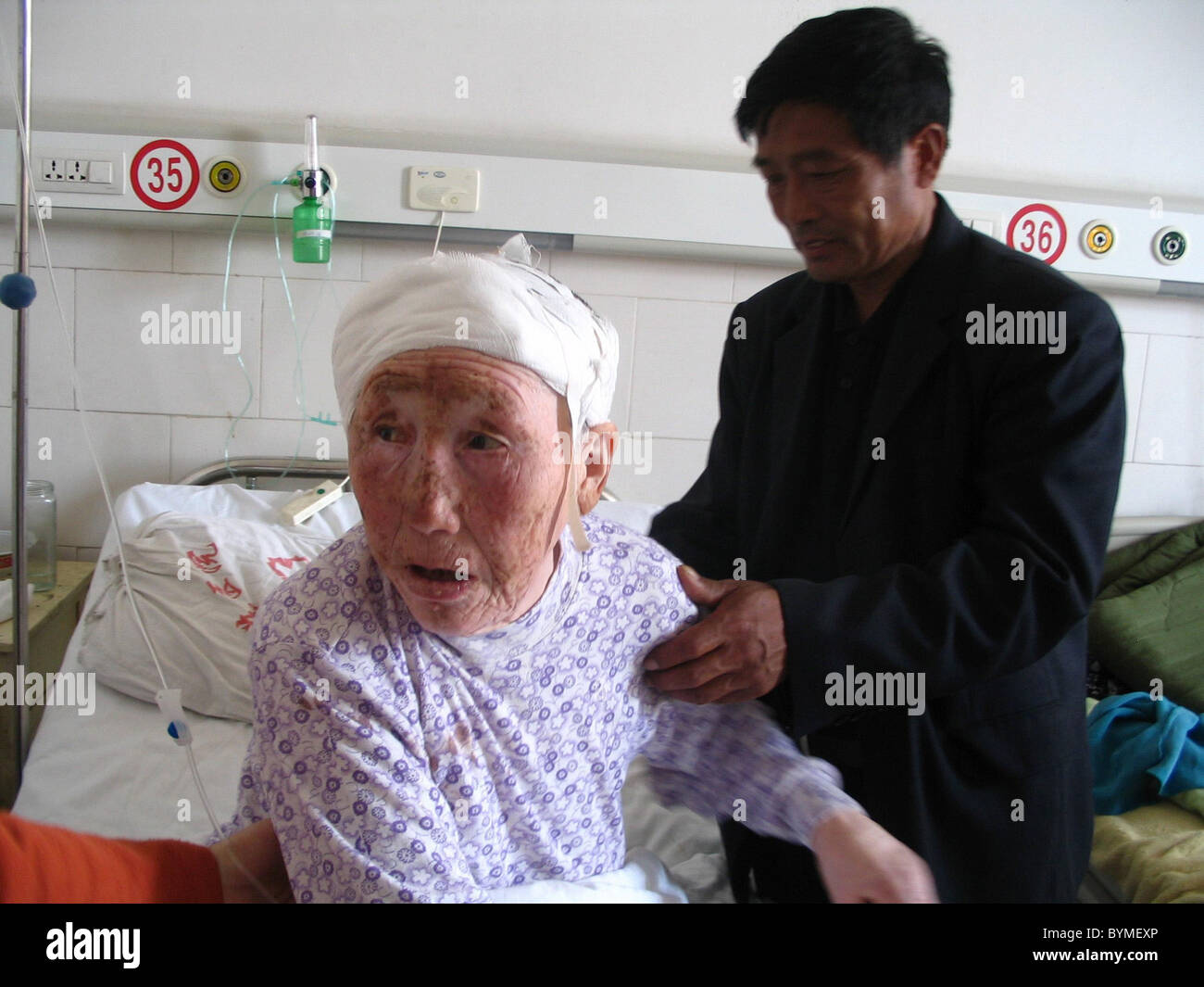 HEADACHE FROM HELL A Chinese grandmother suffering persistent headaches ...