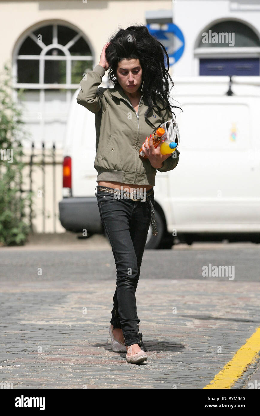 Amy Winehouse pops out to the local shop to pick up some refreshments ...