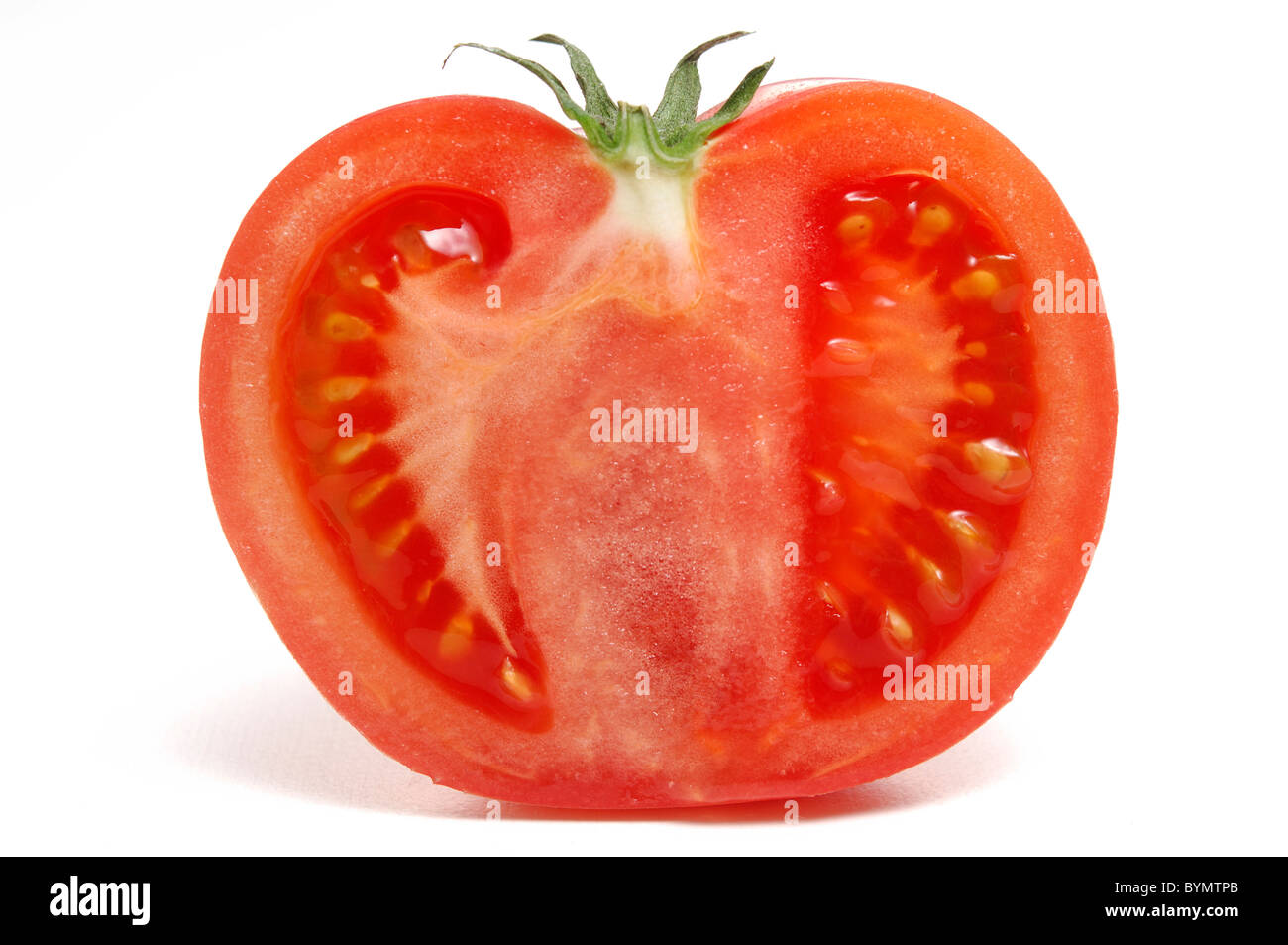 Half of tomato Cut Out Stock Images & Pictures - Alamy