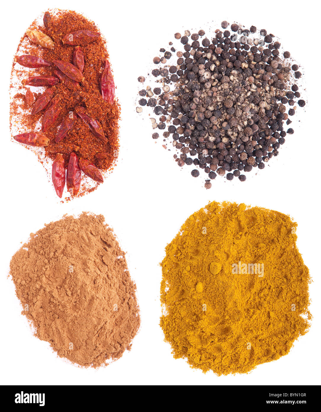 chili, pepper, cinnamon and curry spices isolated on white background ...