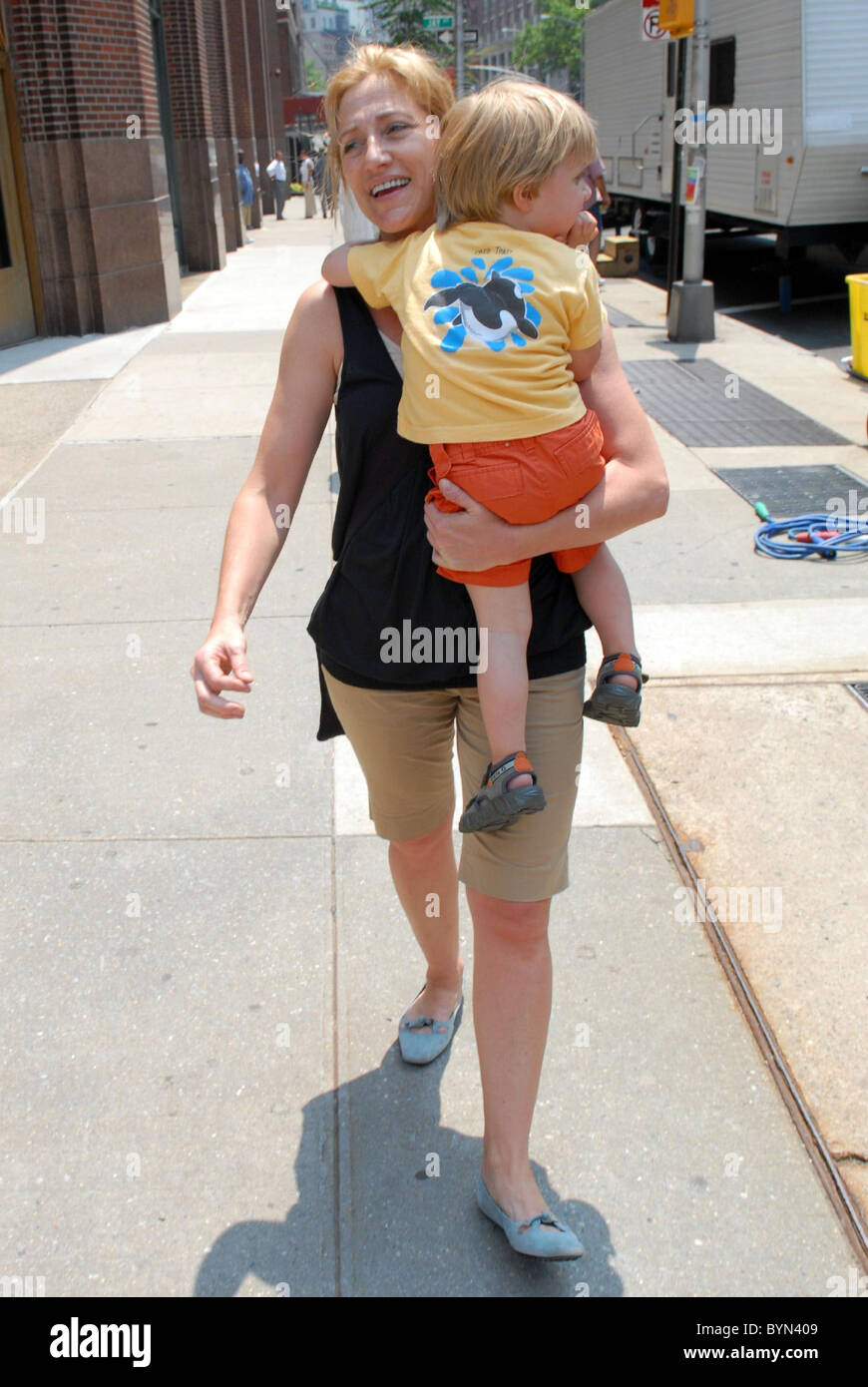 Edie Falco takes a walk in the sunshine with her son Anderson Falco ...