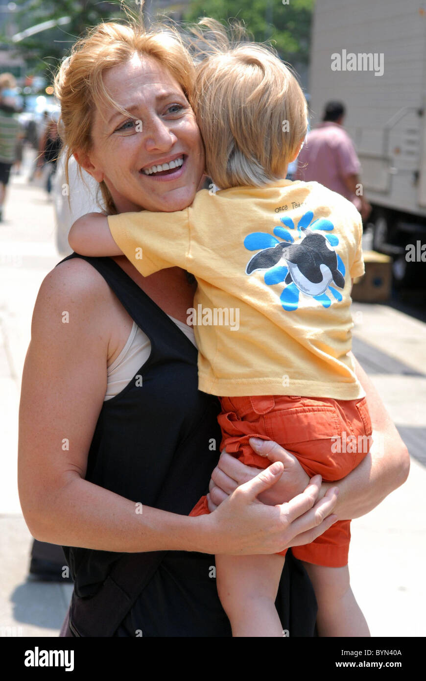 Edie Falco takes a walk in the sunshine with her son Anderson Falco ...