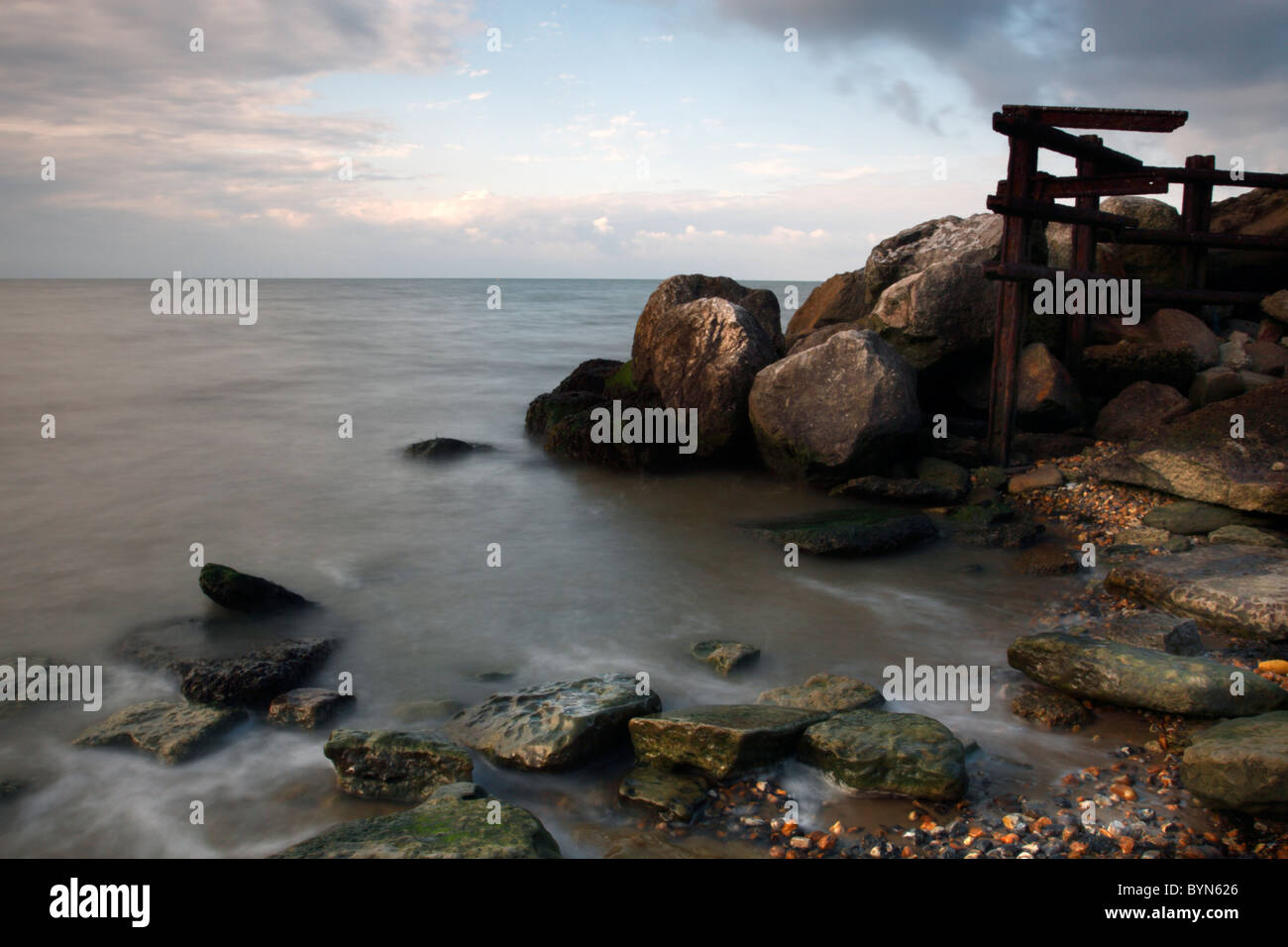 Seascape with remains of sea defences, Reculver Bay, Kent, England, UK ...