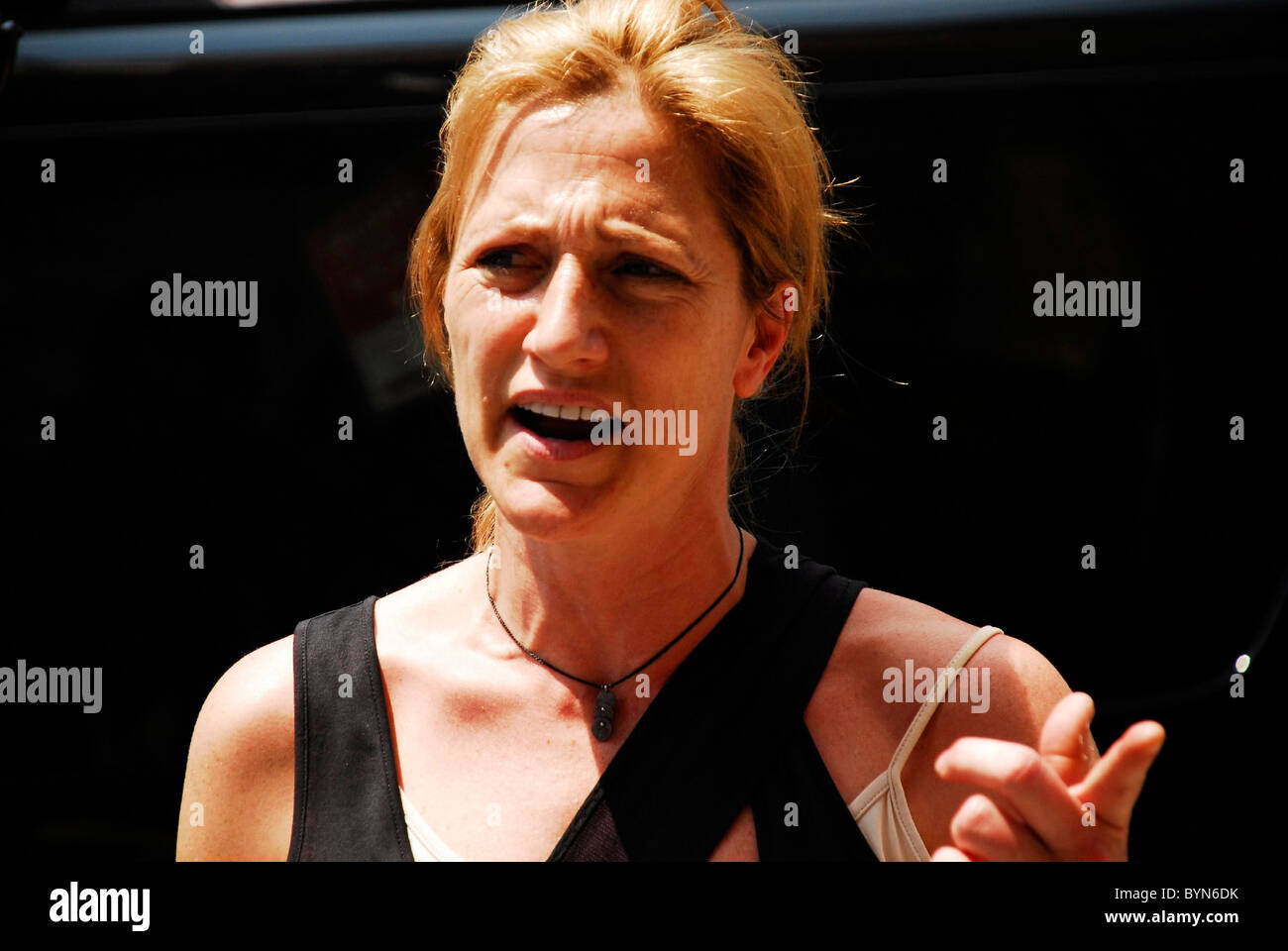 Edie Falco takes a walk in the sunshine with her son Anderson Falco ...