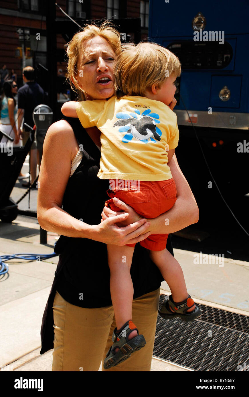 Edie Falco takes a walk in the sunshine with her son Anderson Falco ...