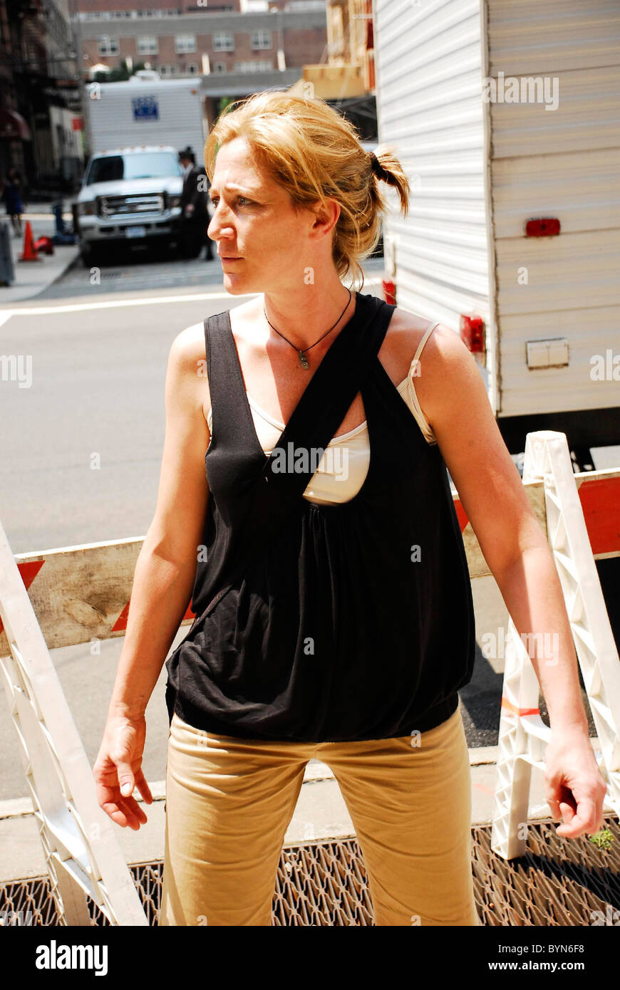 Edie Falco takes a walk in the sunshine with her son Anderson Falco ...
