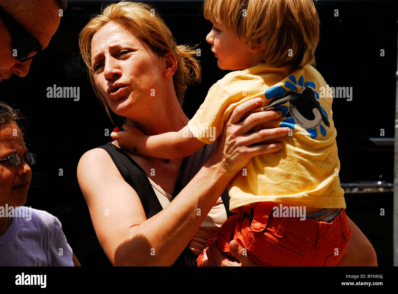 Edie Falco takes a walk in the sunshine with her son Anderson Falco ...