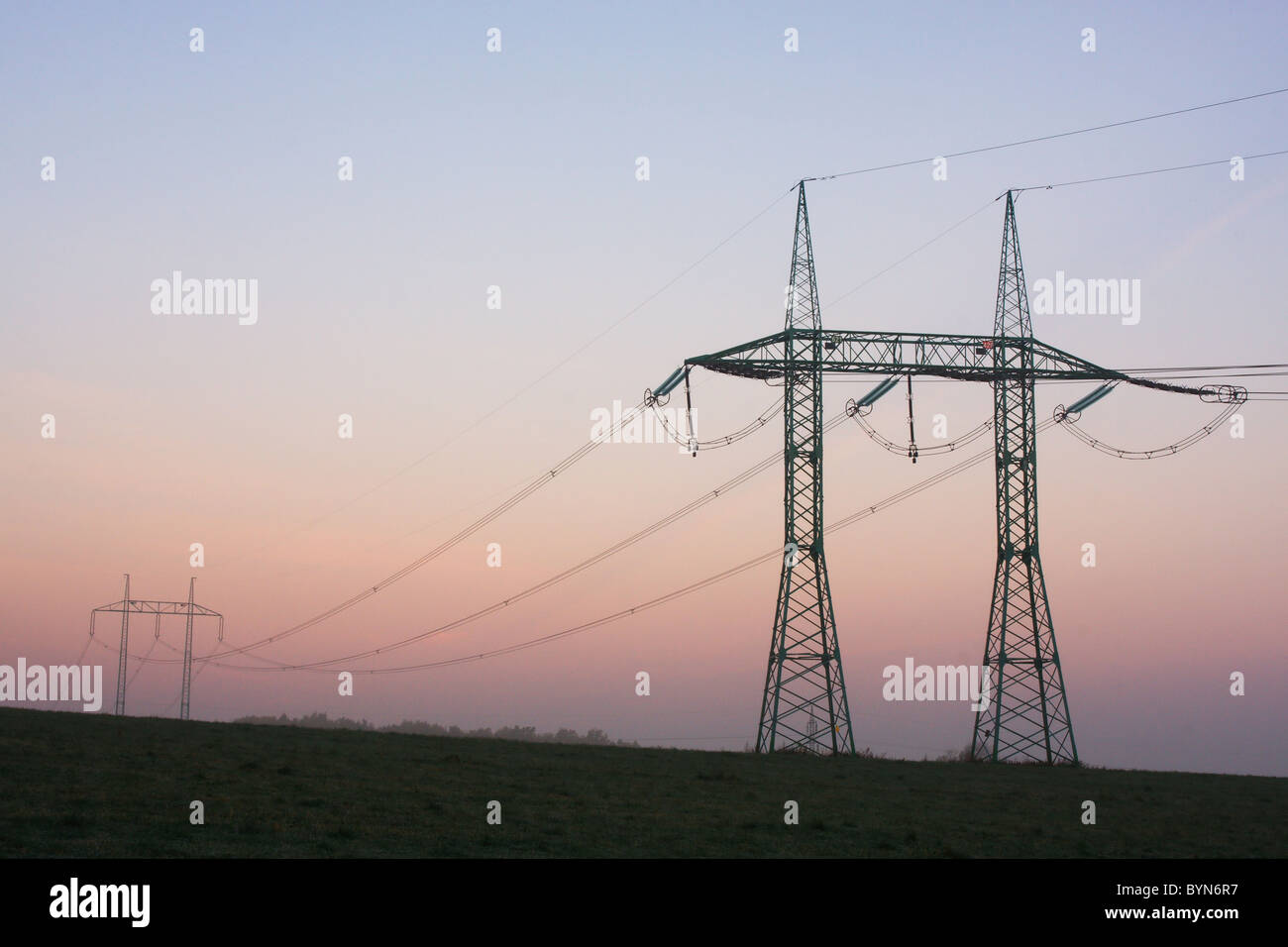 High voltage electricity pylons over sky Stock Photo - Alamy High voltage electricity pylons over sky Stock Photo - Alamy