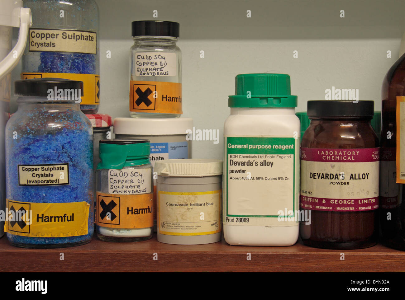 Containers of copper sulphate crystals, devarda's alloy powder in a ...