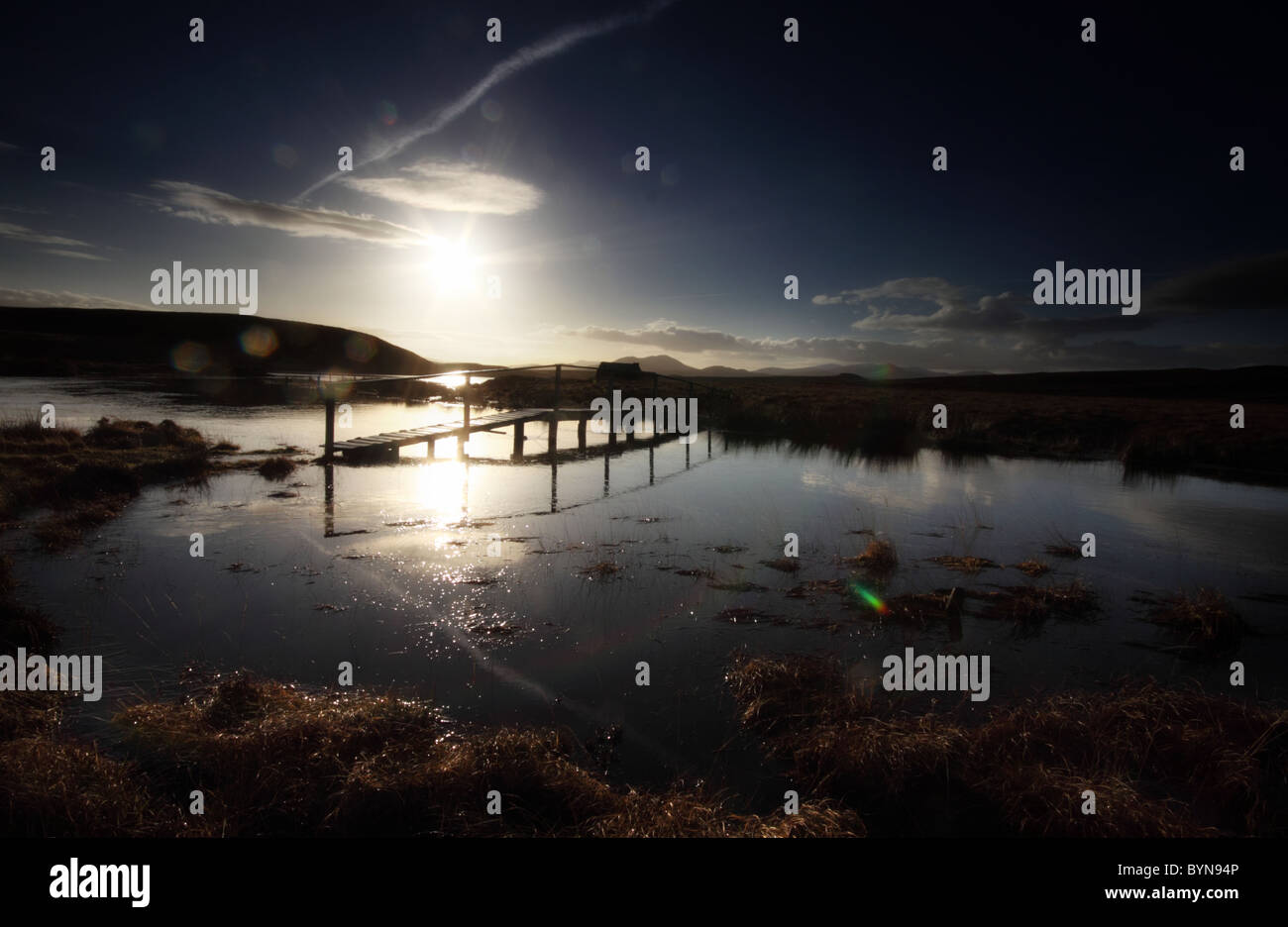 Sun setting over water mountains hi-res stock photography and images ...