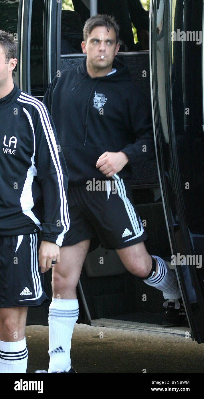 Soccer Players Smoking Cigarettes