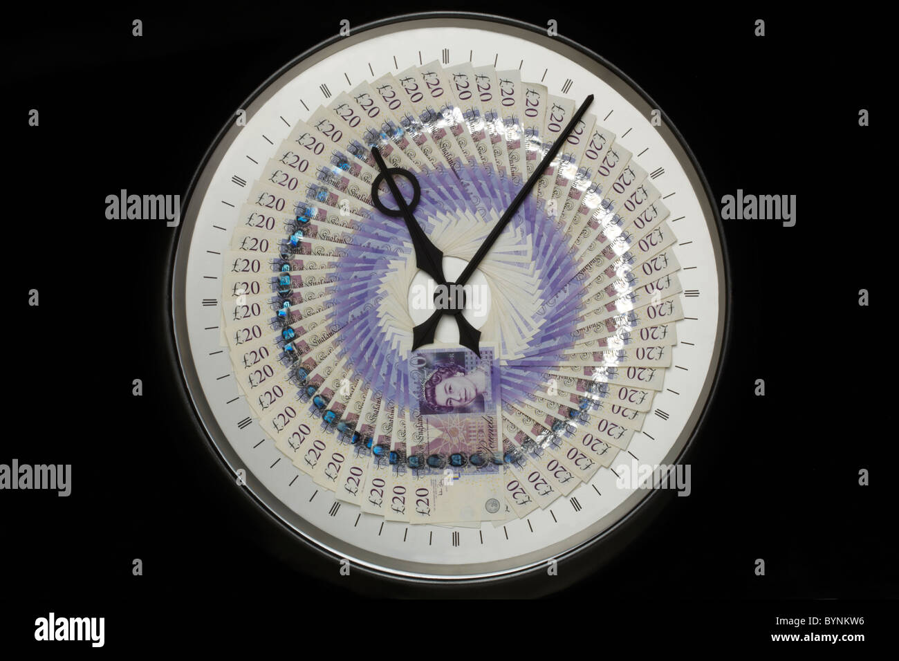 Money clock pounds hi-res stock photography and images - Alamy