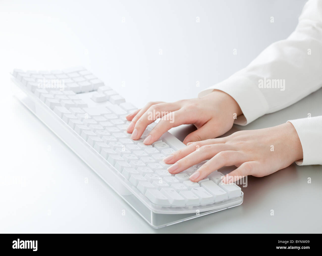 Woman Computer Keyboard Side View Typing Stock Photo - Alamy