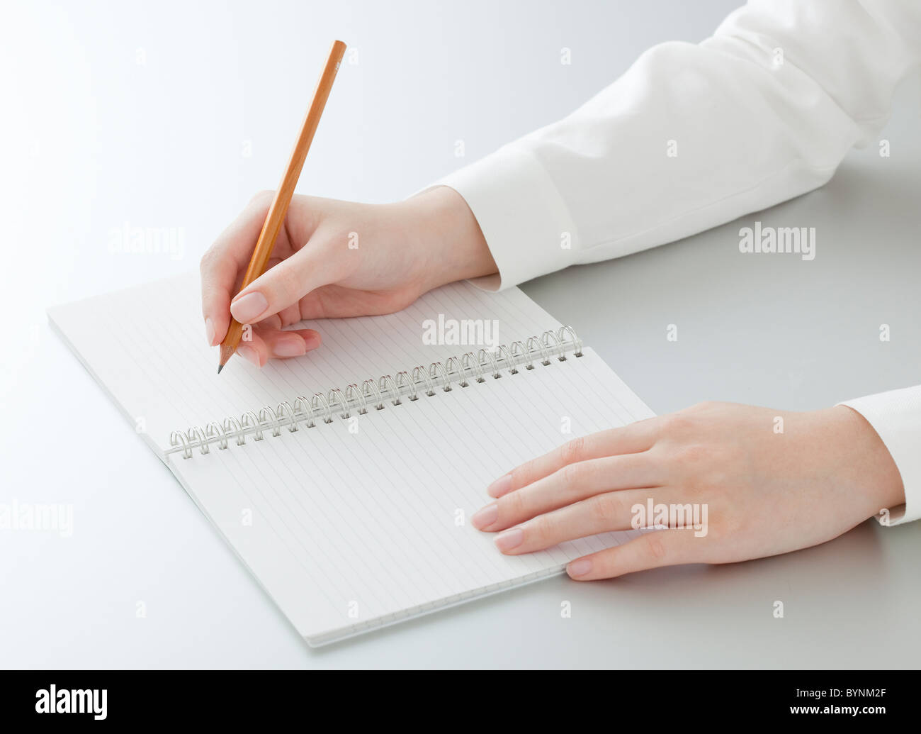 Woman Human Hand Holding Pencil Note Pad Writing Stock Photo - Alamy