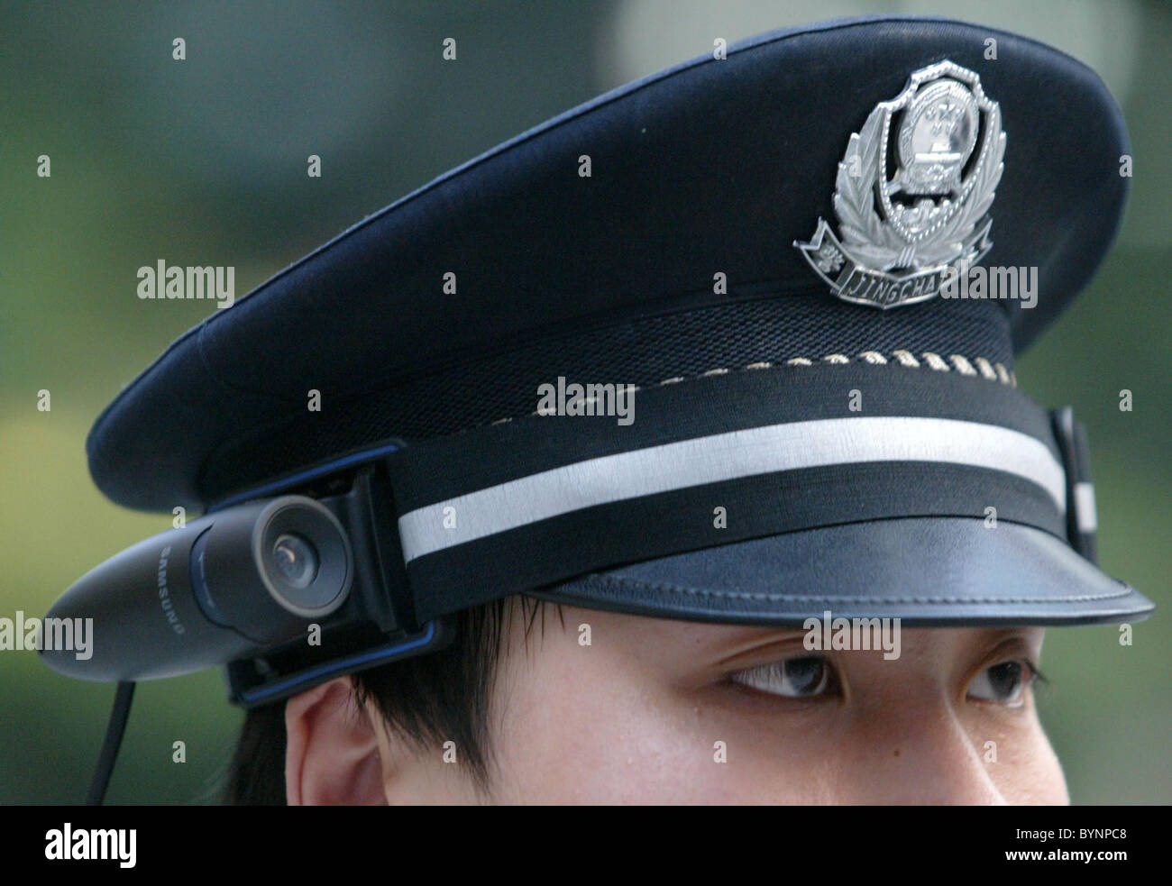* POLICE CAMERA ACTION Chinese police get snap happy as they take their ...