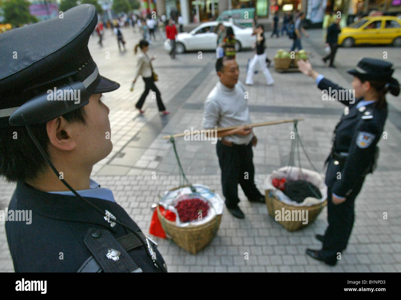 * POLICE CAMERA ACTION Chinese police get snap happy as they take their ...