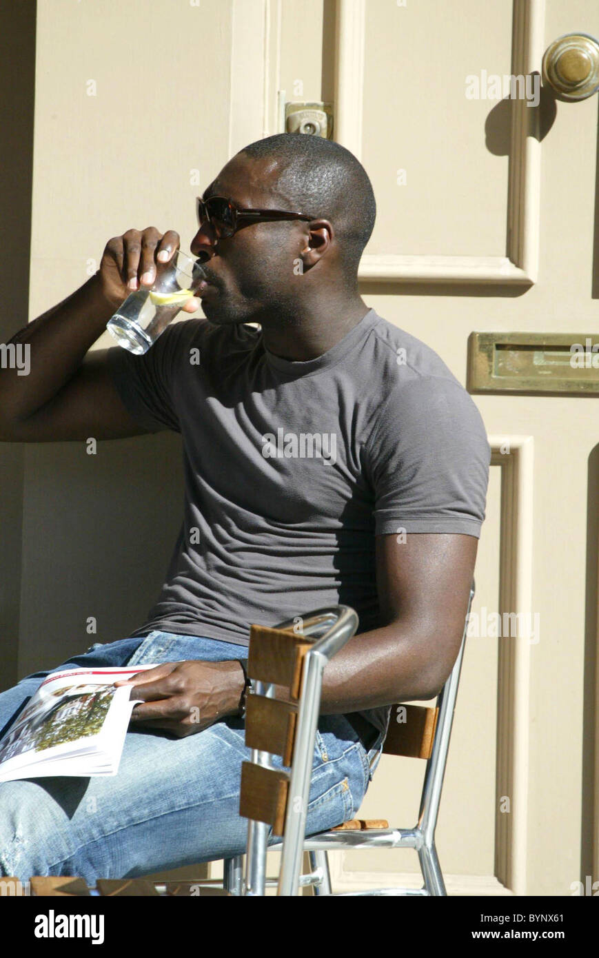 Sol Campbell enjoys a healthy salad in the sunshine in Primrose Hill ...