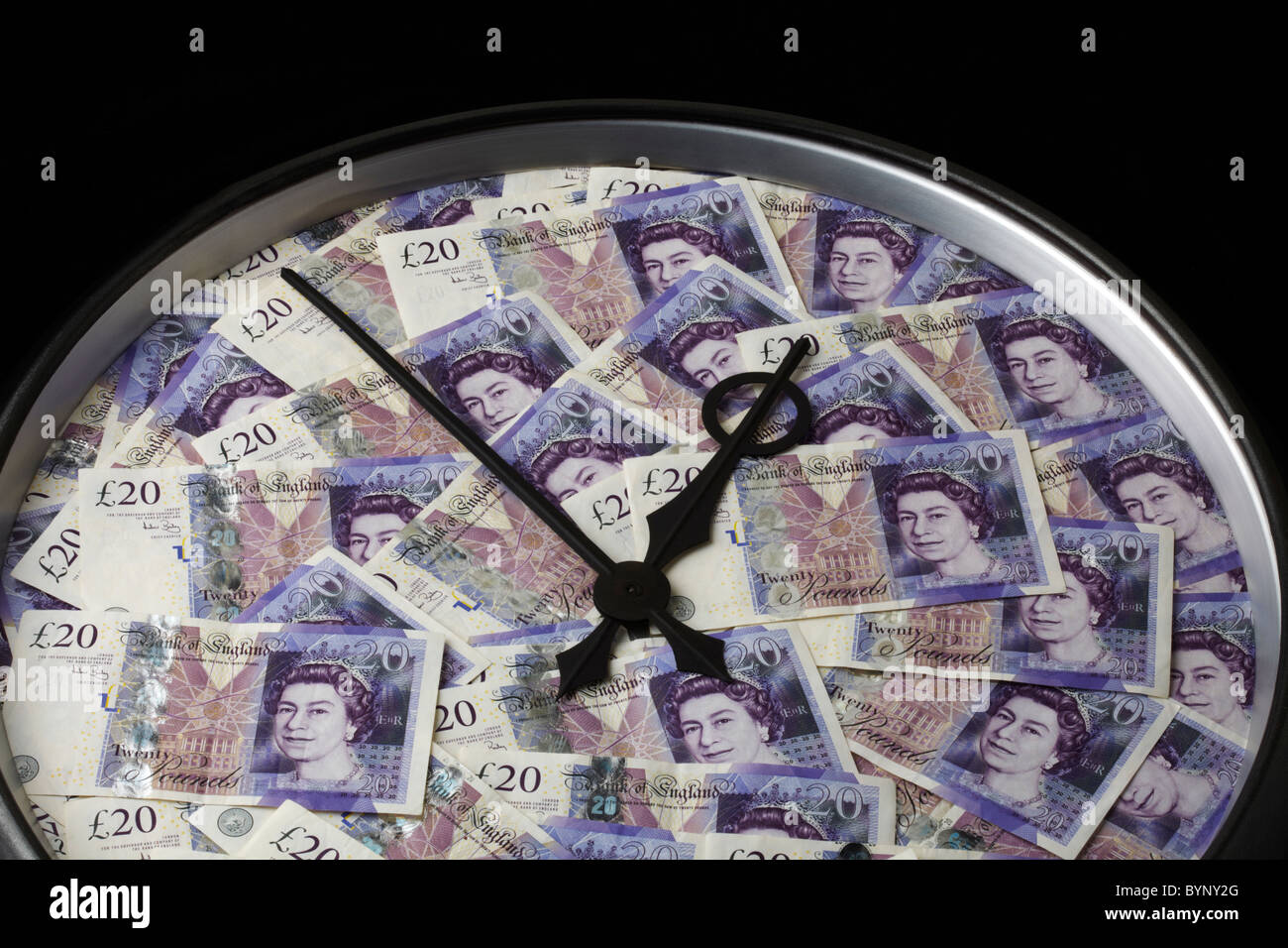 Twenty Pound Notes on Clock Face with Hands Stock Photo - Alamy