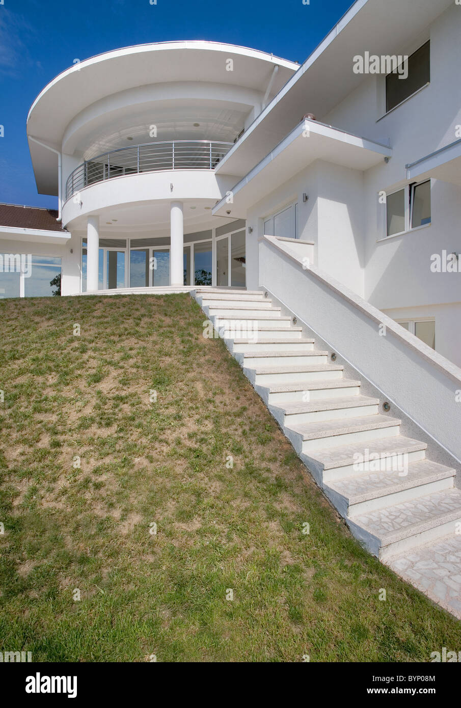 Modern house exteriors during day and night Stock Photo - Alamy