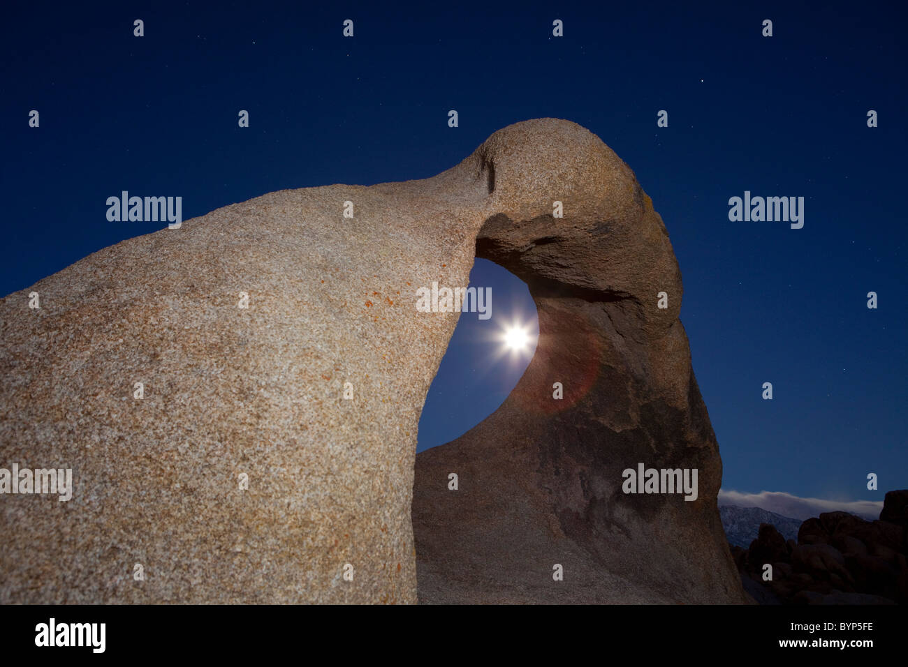 Full moon with Mobius Arch in the Alabama Hills with the Sierras in the ...
