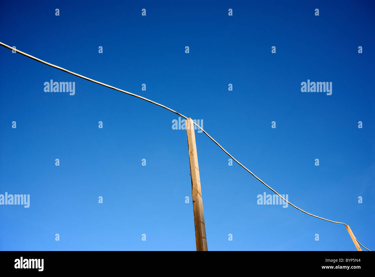 Line Wooden Poles High Resolution Stock Photography and Images - Alamy