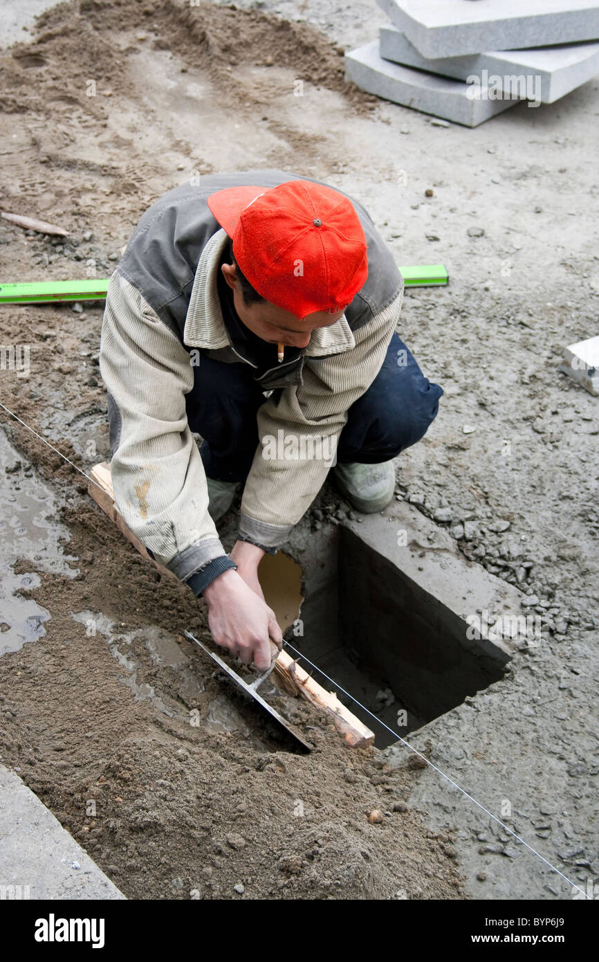 Labor at construction site Stock Photo - Alamy