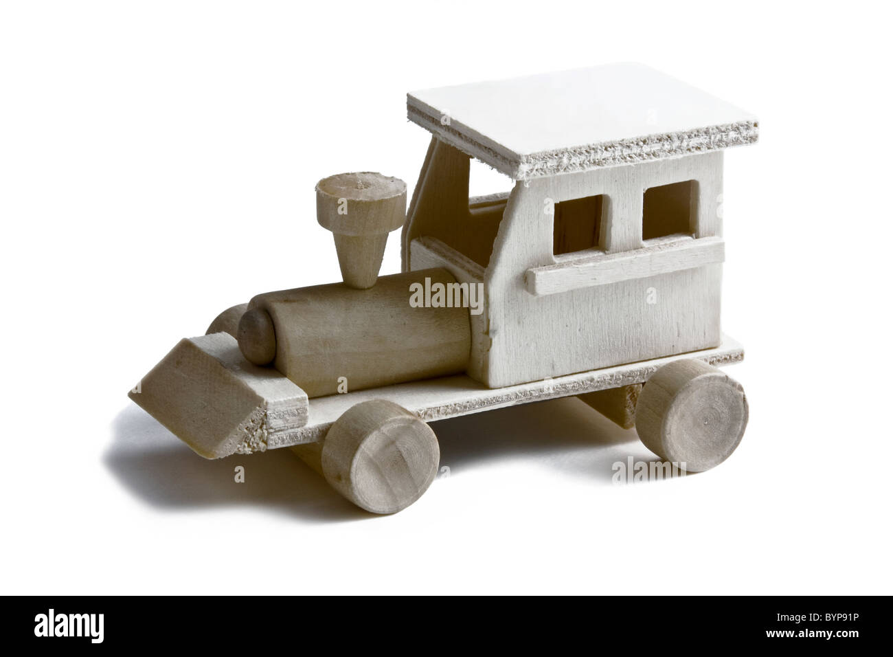 Wooden toy train with wheels on white background Stock Photo - Alamy