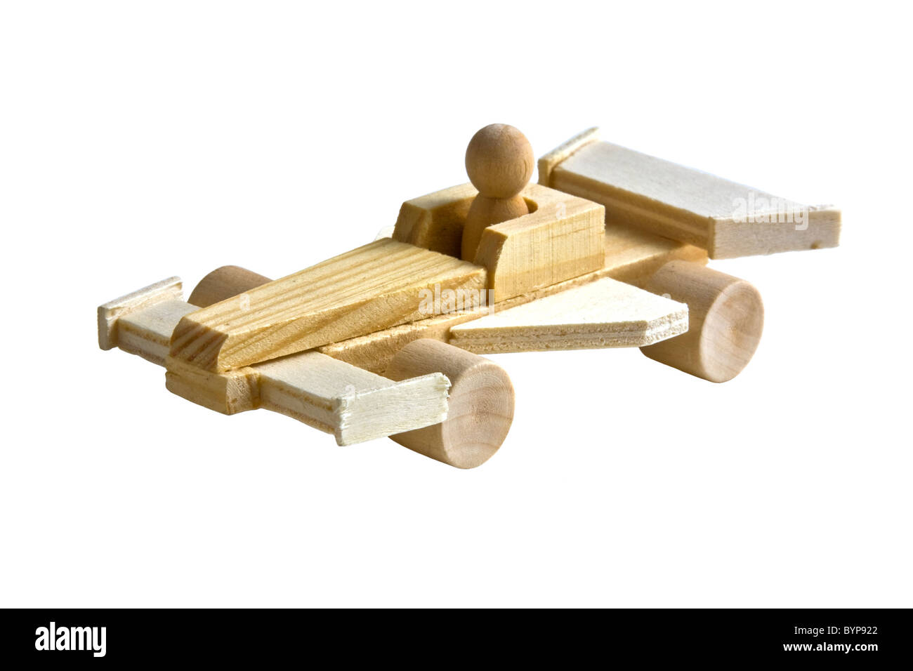 Wooden toy race car with driver on white background Stock Photo - Alamy