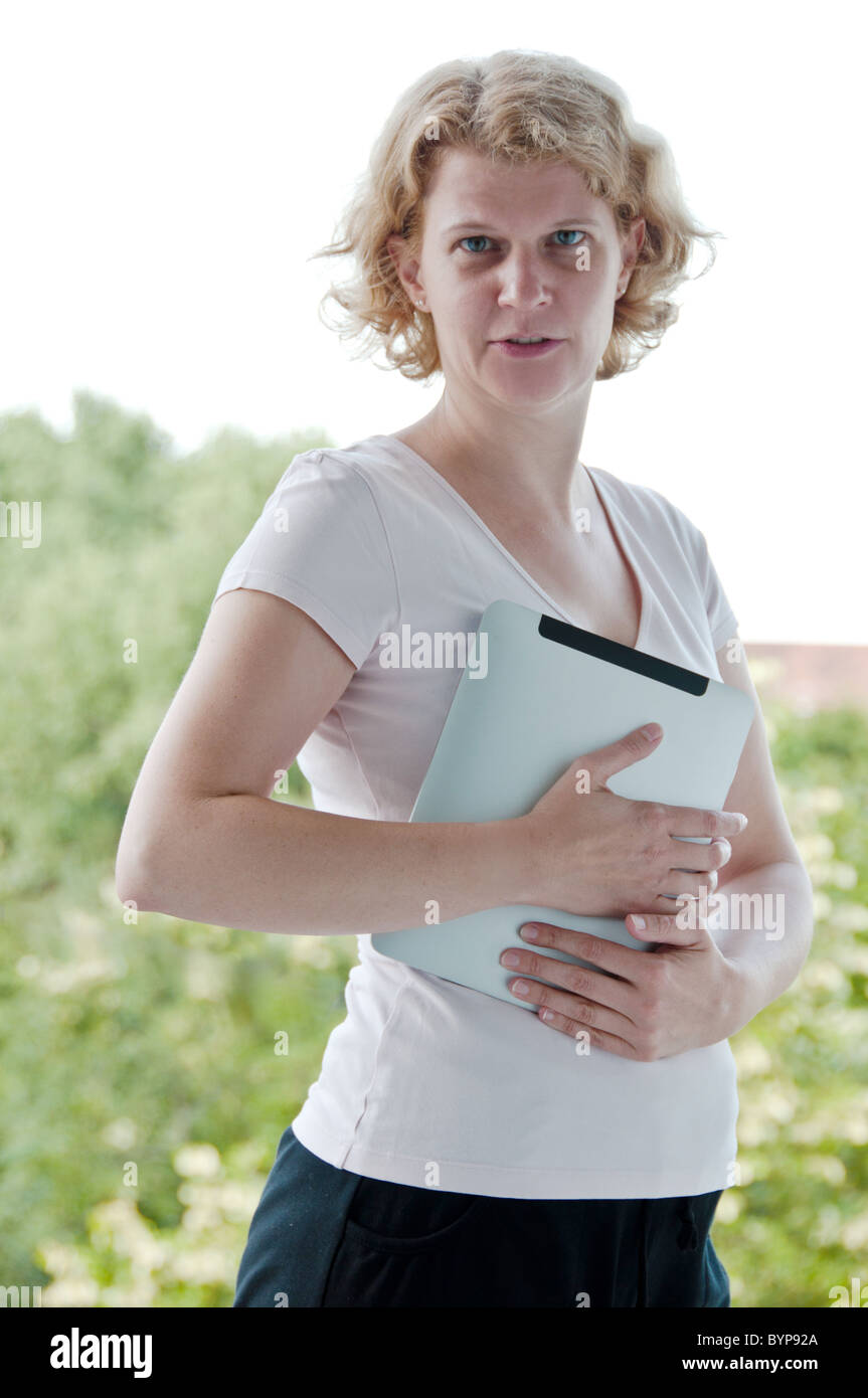 Woman carrying computer monitor hi-res stock photography and images - Alamy