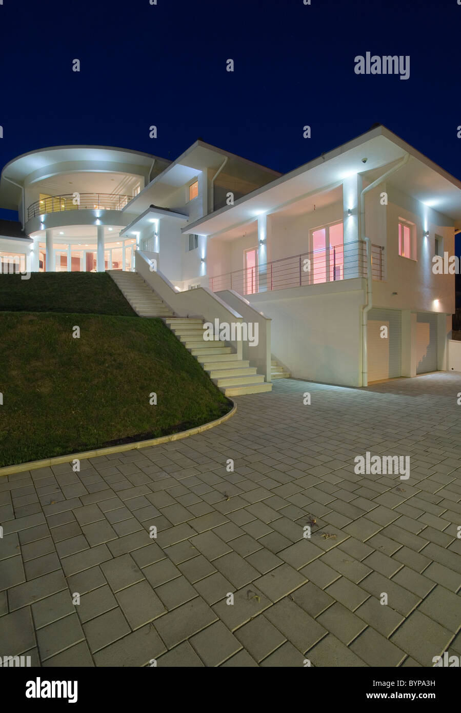 Modern house exteriors during day and night Stock Photo - Alamy