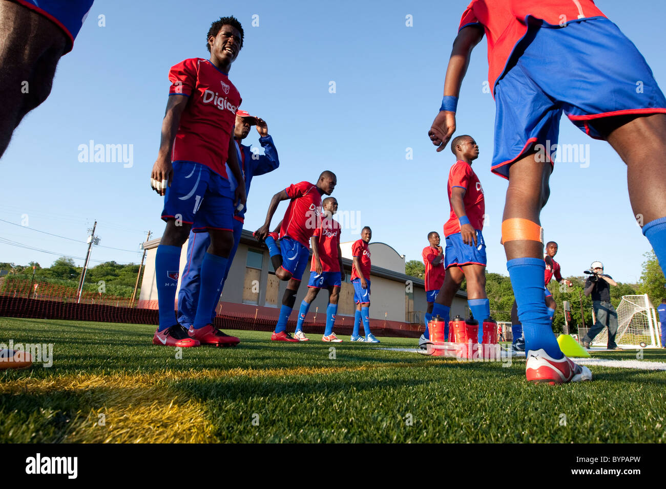 The Haitian National Soccer team warms up on the field before an ...