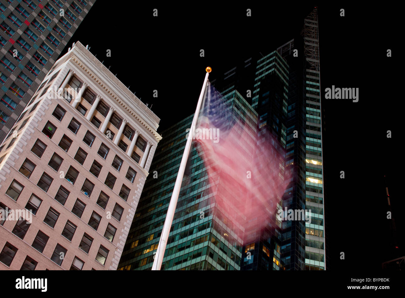 USA, New York, New York City, Blurred image of American Flag flying ...