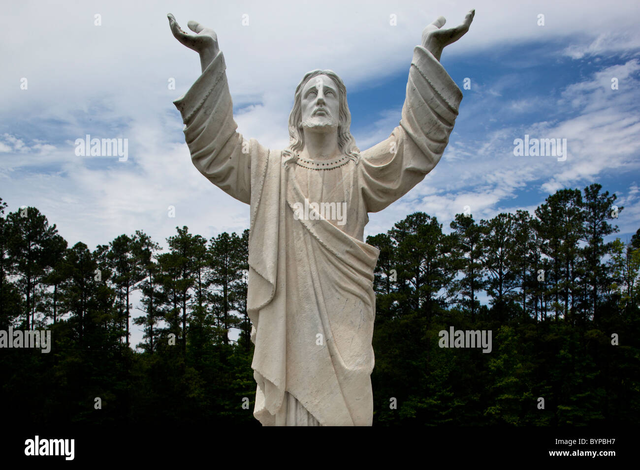 USA, North Carolina, Manchester, Statue of Jesus in cemetery on summer ...