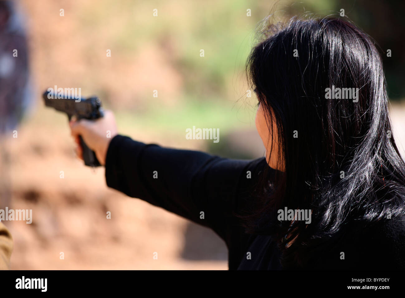 Shooting practice gun aim precision woman hi-res stock photography and ...