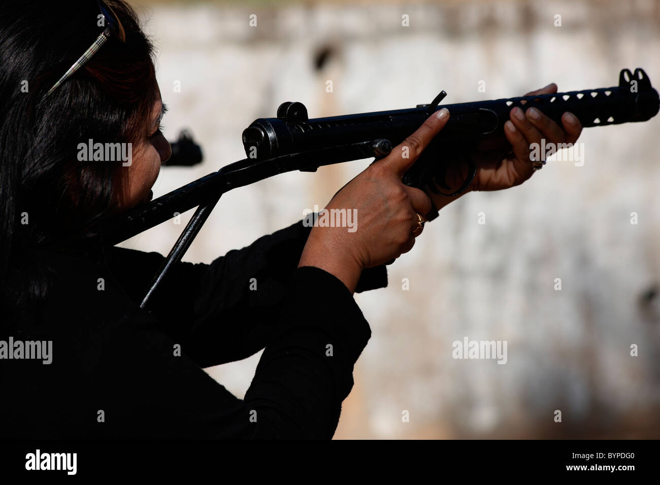 Shooting practice gun aim precision woman hi-res stock photography and ...
