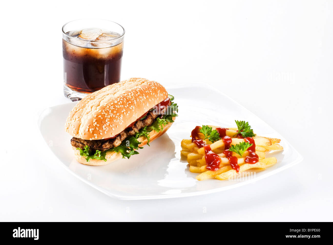 Ribeye steak in sesame seed bun with fries and coke Stock Photo - Alamy