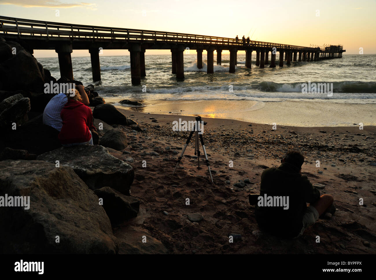Swakopmund, Namibia, photographers taking sunset photos on beach ...