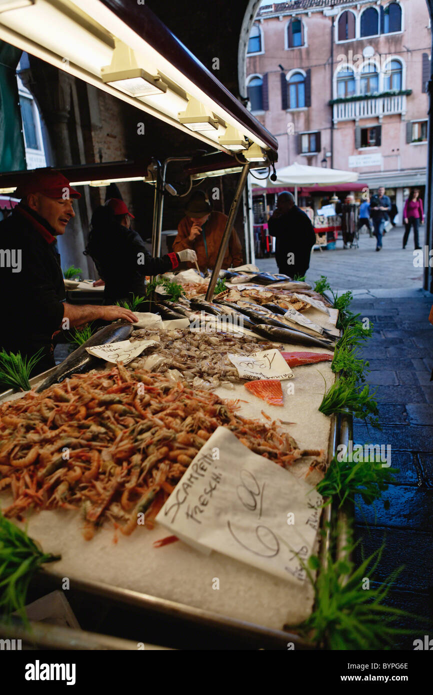 Fish Vendors at their Market Stand, Rialto, Venica, Italy Stock Photo ...